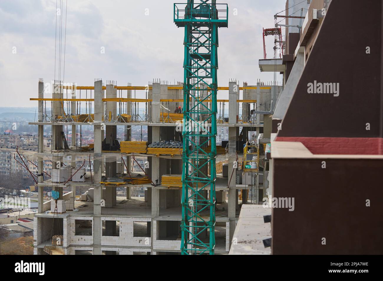 Construction site. High rise Building under construction. Construction ...