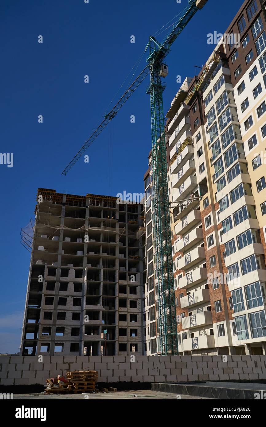 Construction site. High rise Building under construction. Construction ...
