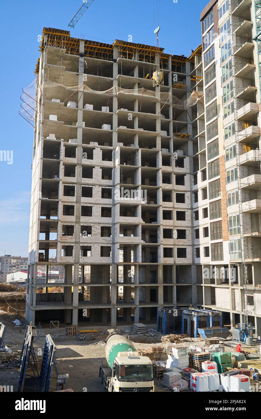 Construction site. High rise Building under construction. Construction ...