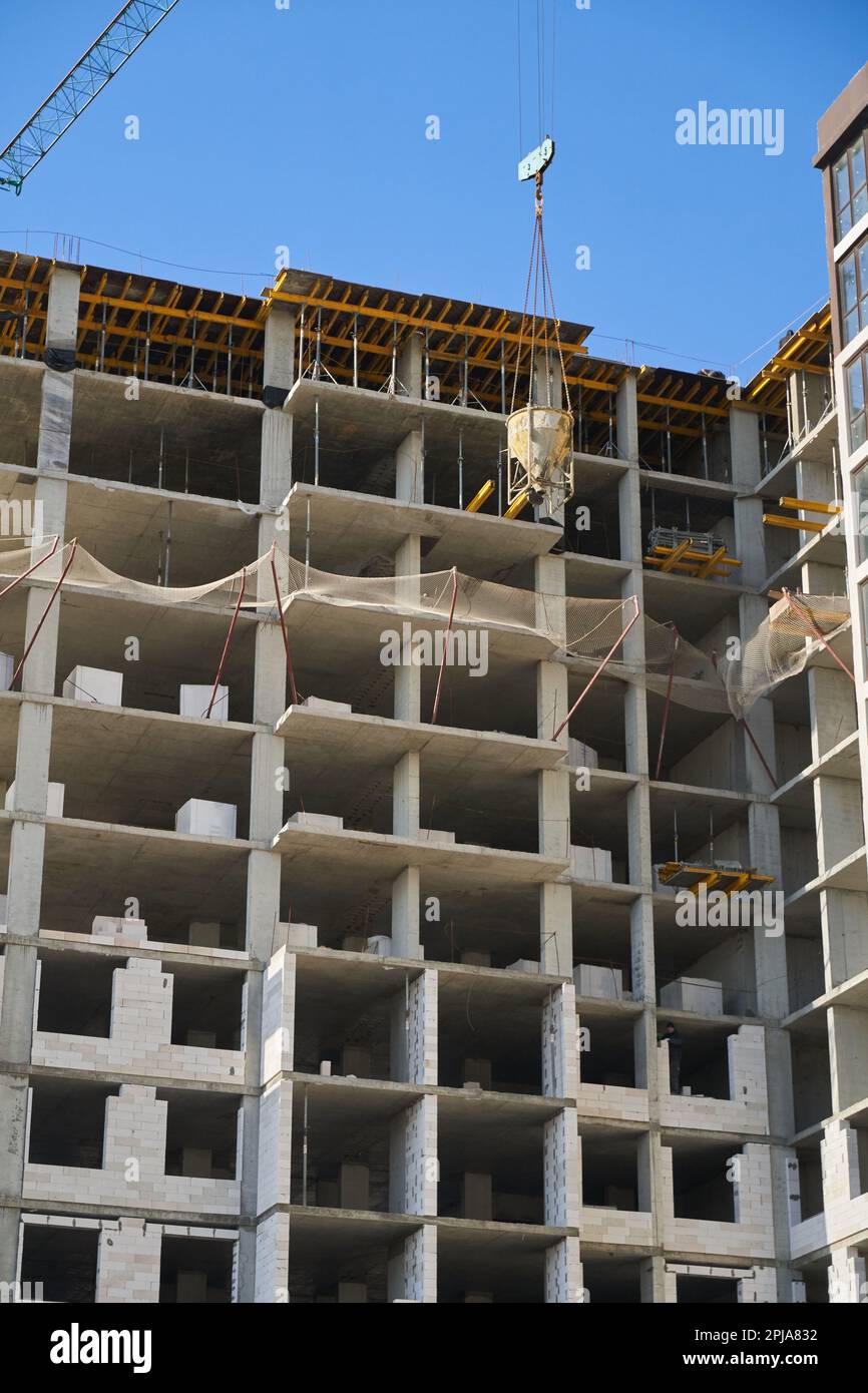 Construction site. High rise Building under construction. Construction ...