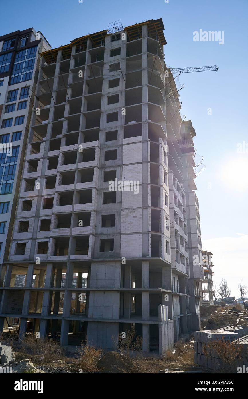 Construction site. High rise Building under construction. Construction ...