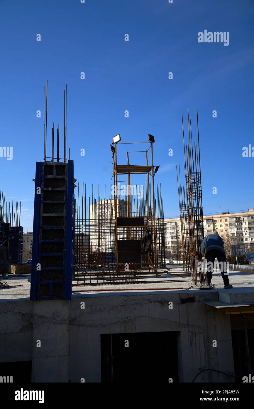 Construction site. High rise Building under construction. Construction ...