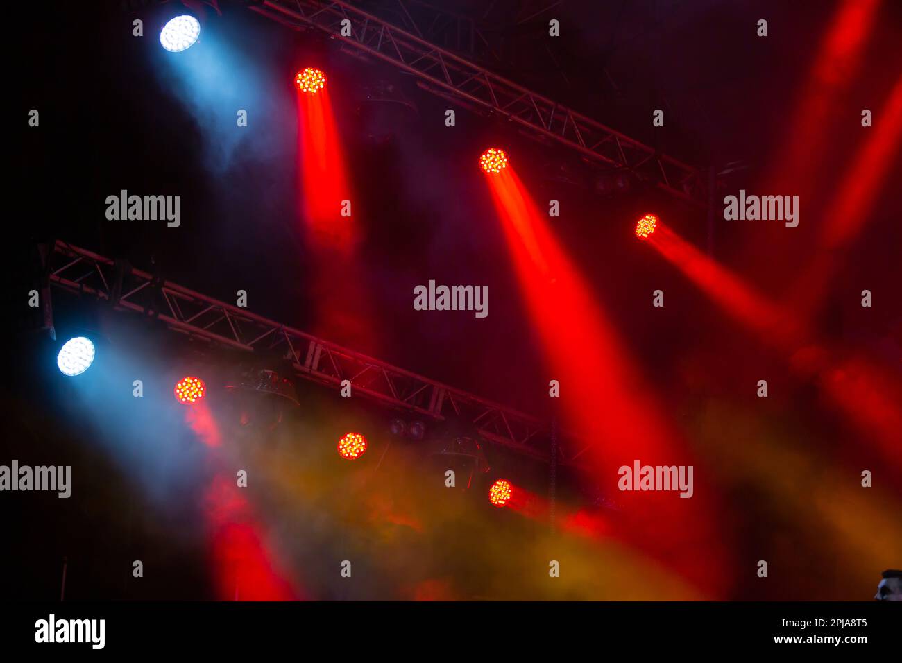 Lights show. Lazer show night light with smoke and lights Stock Photo ...