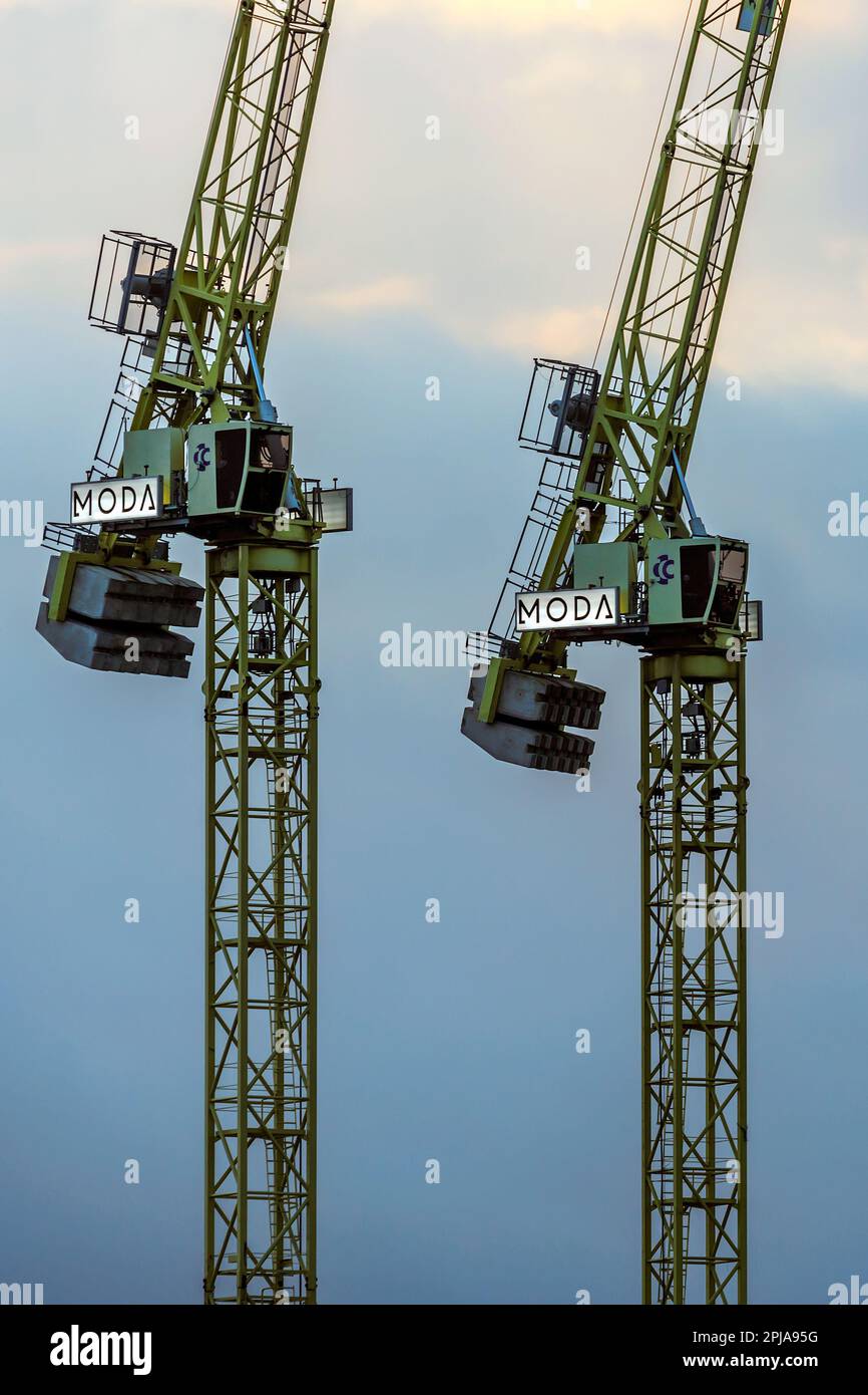 Twin cranes hi-res stock photography and images - Alamy