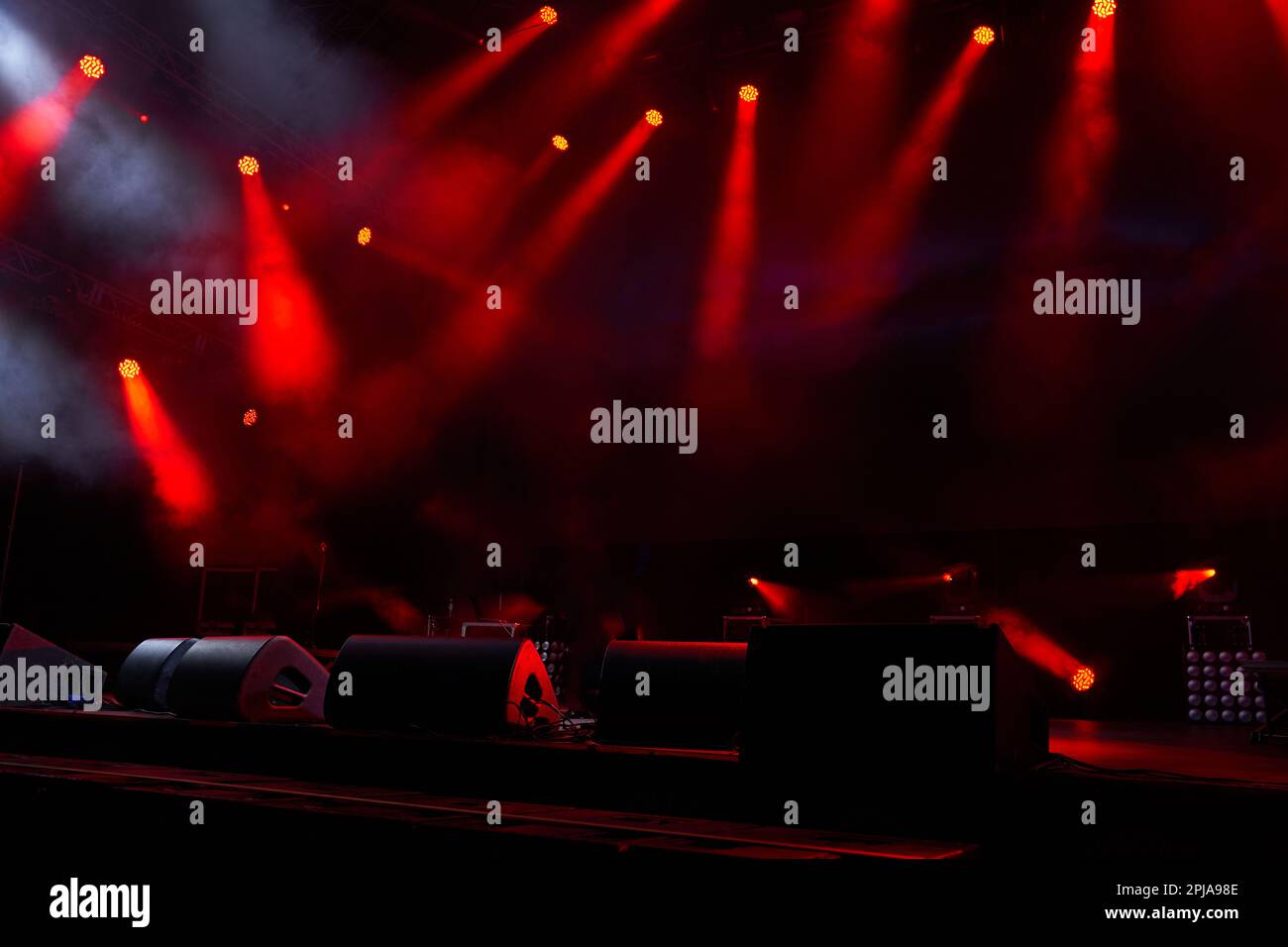 Red stage lights with smoke on concert. Background in show. Interior ...
