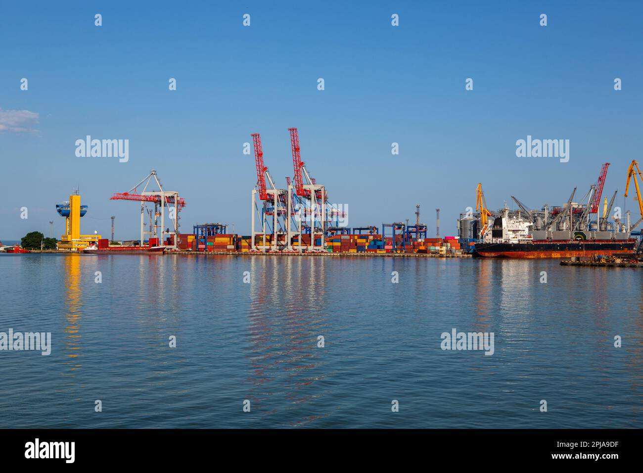 View of the seaport with containers elevator and bulk carrier Stock ...