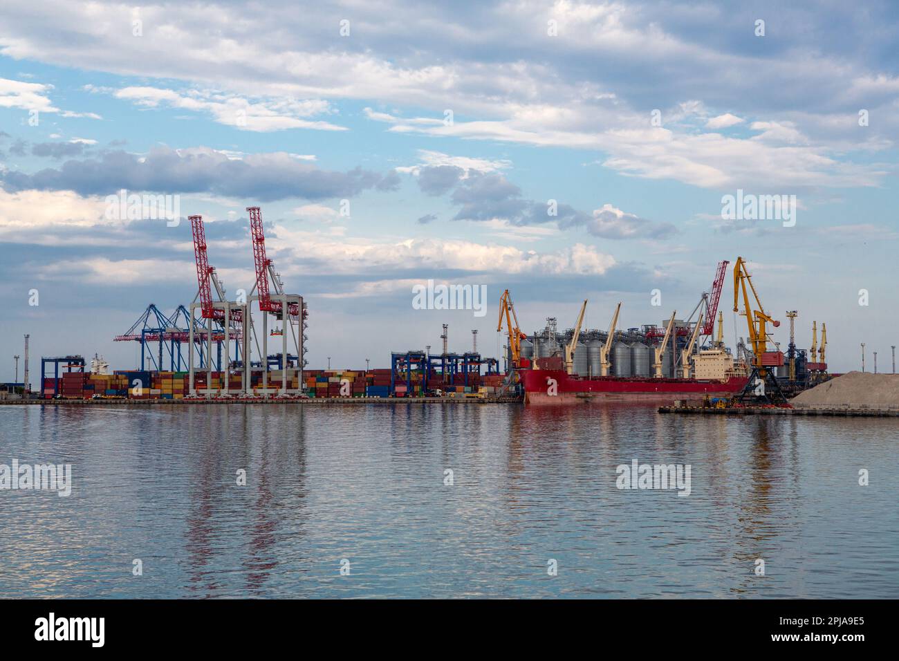 View of the seaport with containers elevator and bulk carrier Stock ...