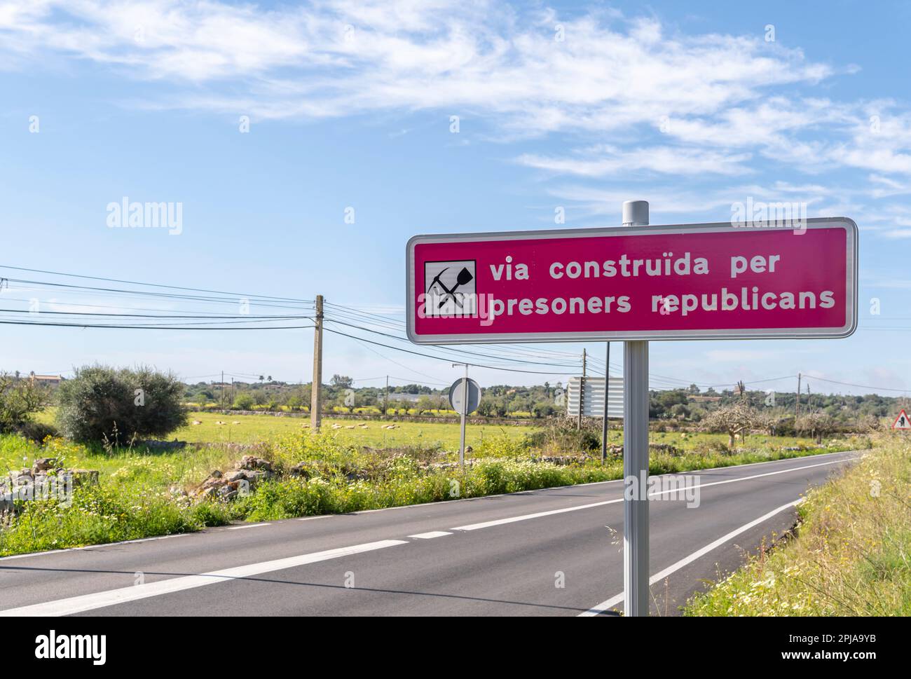 Sign written in Catalan explaining that road was built by Republican ...
