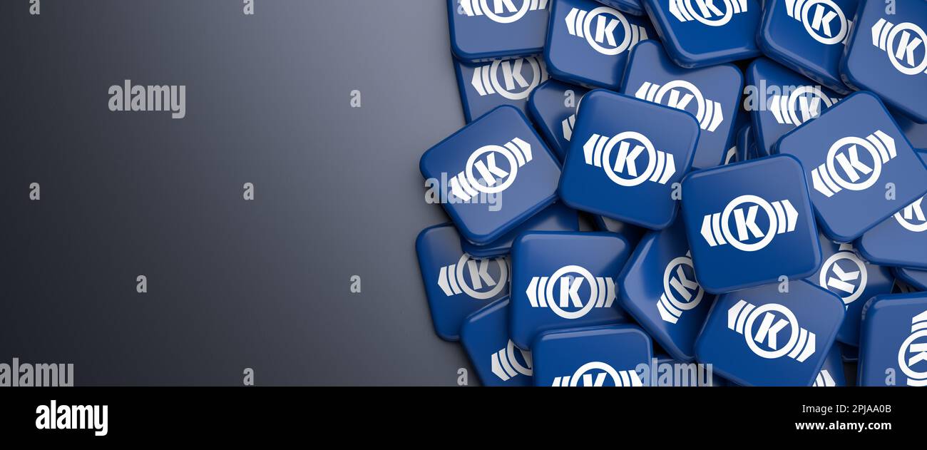 Logos of the German manufacturer of braking systems Knorr Bremse on a heap on a table. Web ...