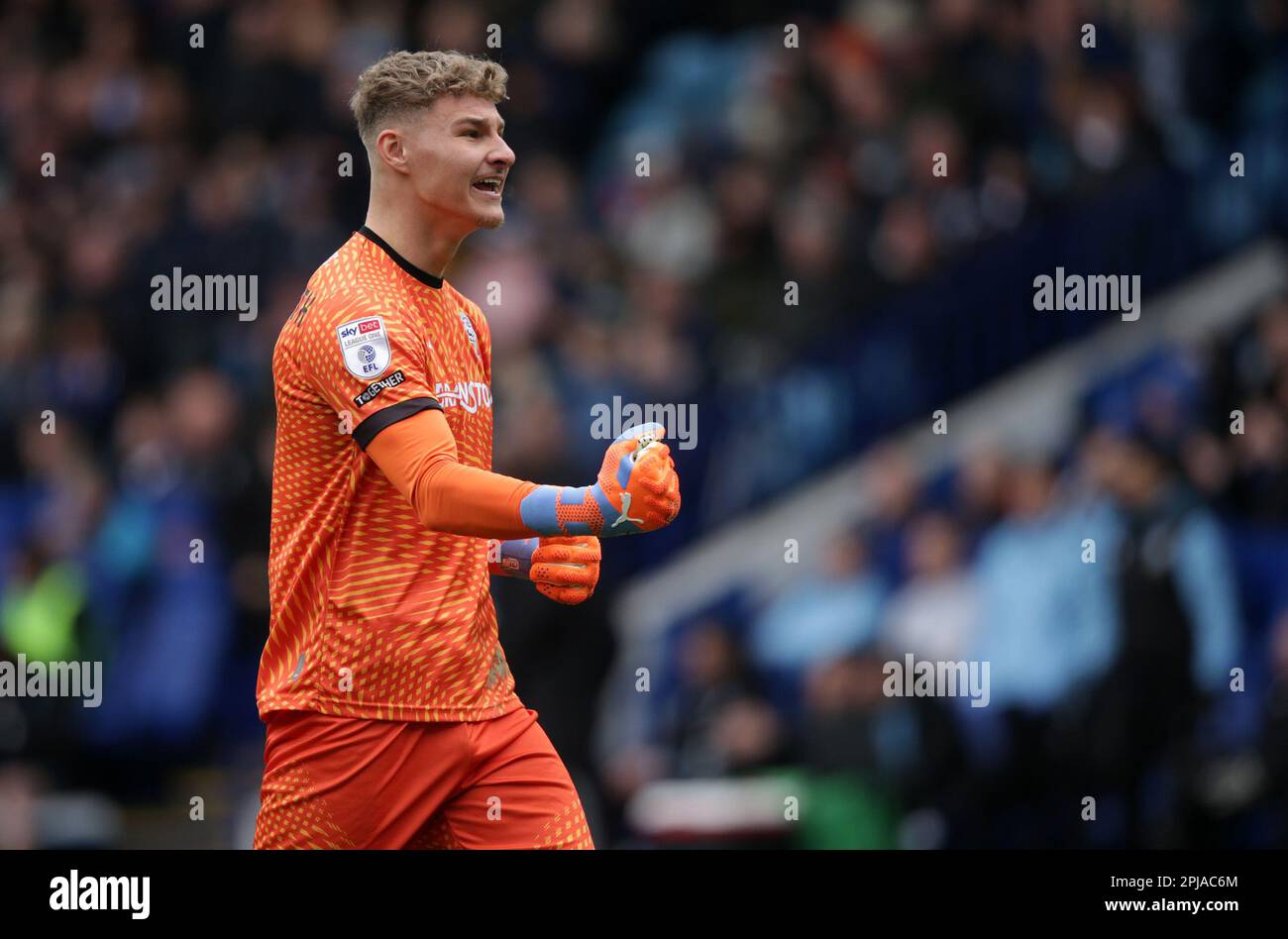 Lincoln City goalkeeper Carl Rushworth celebrates after his side scored ...