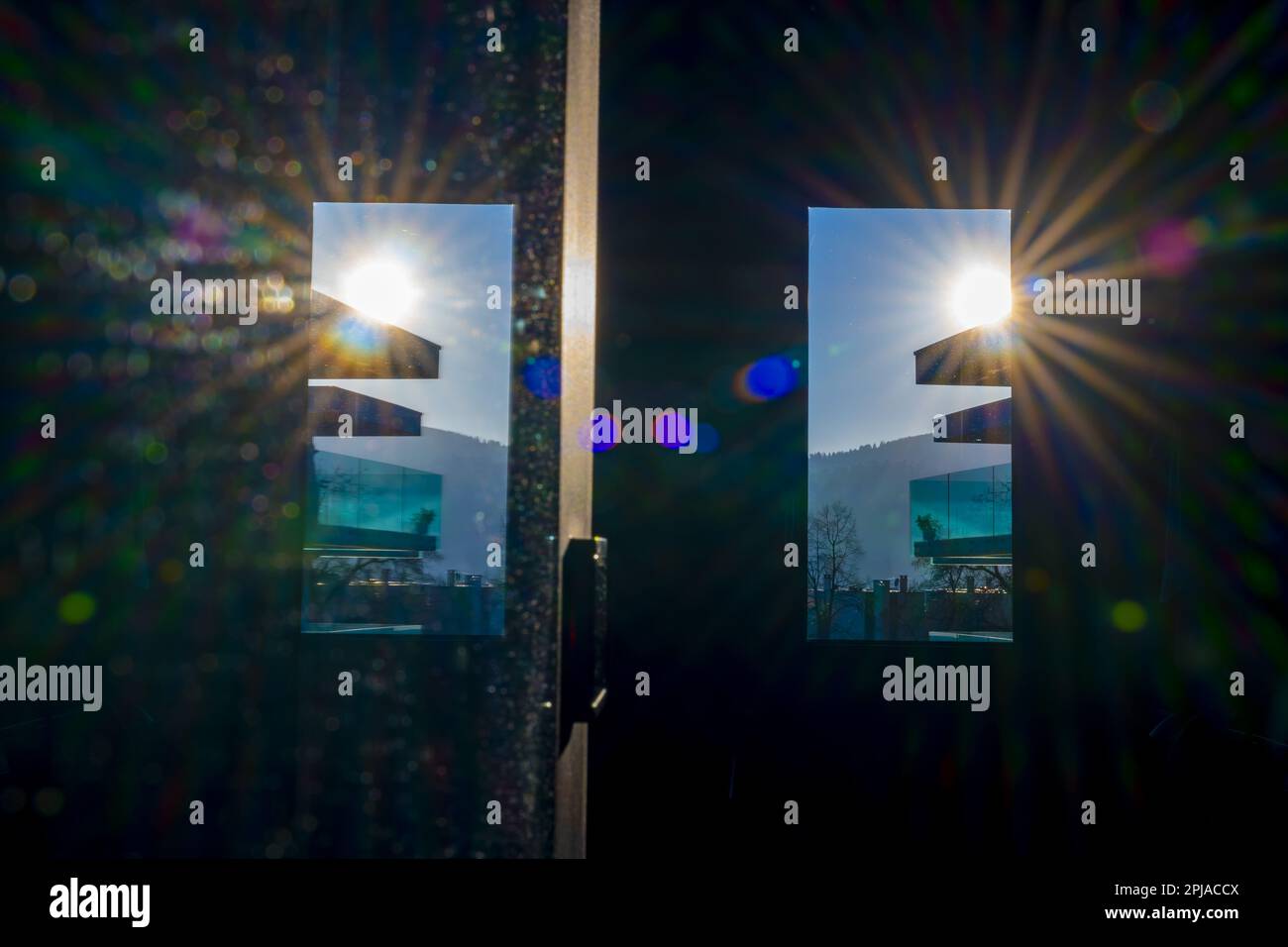 Double Window View Reflected in a Mirror with Sunbeam and Lens Flare in ...