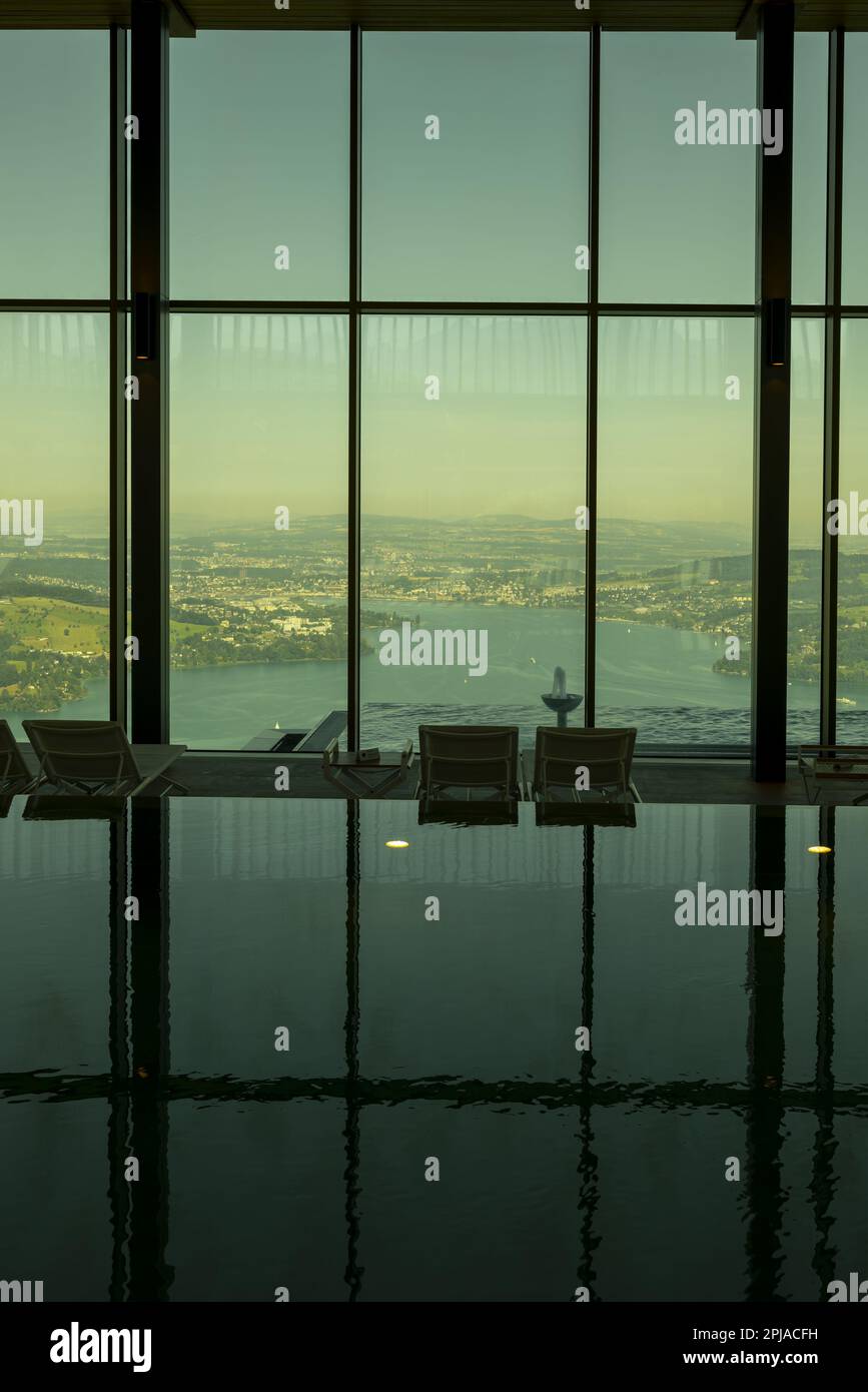 Infinity Swimming Pool with Window View over City and Lake Lucerne in ...