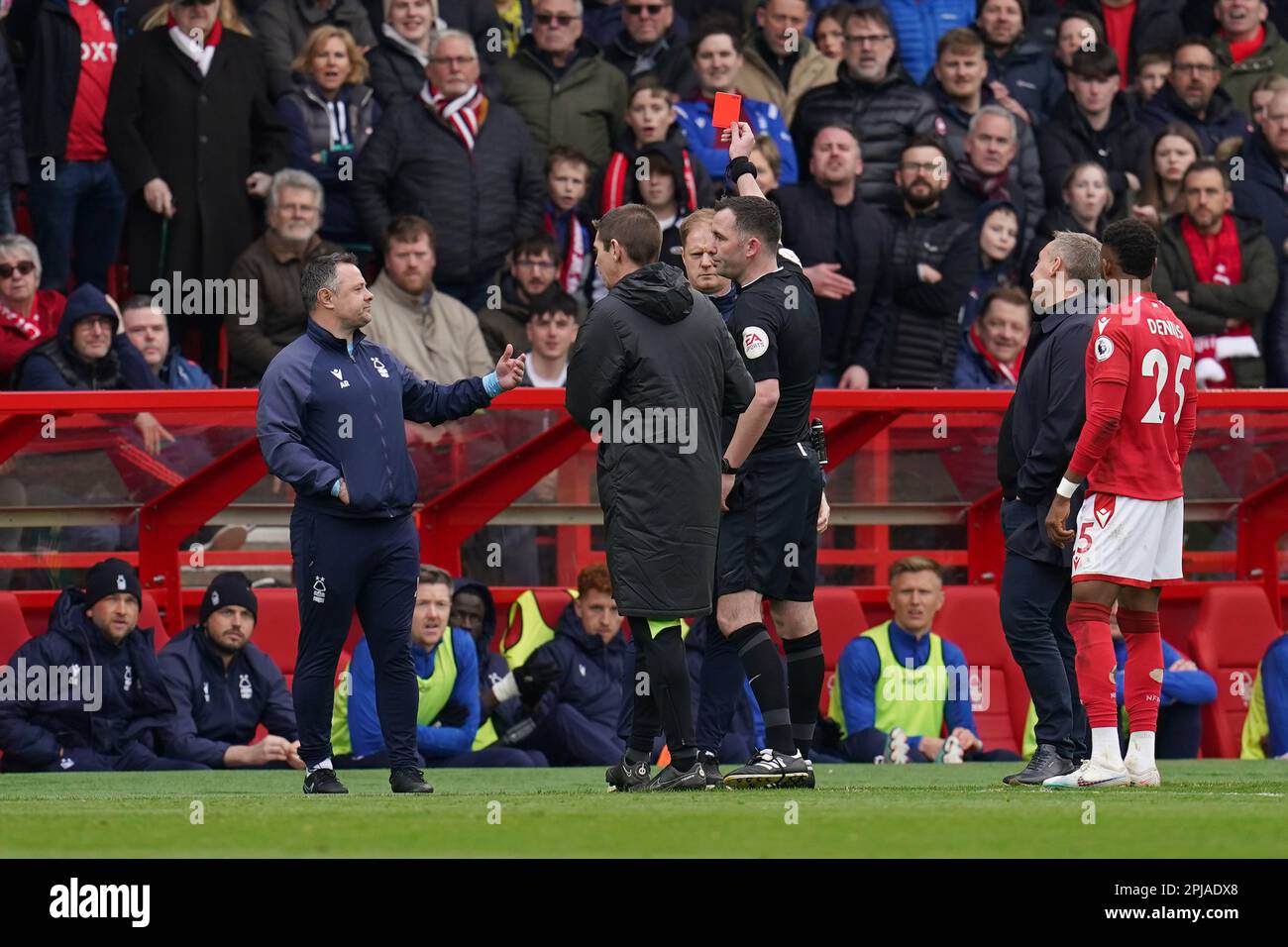 Nottingham Forest assistant manager Alan Tate (left) is shown a red ...