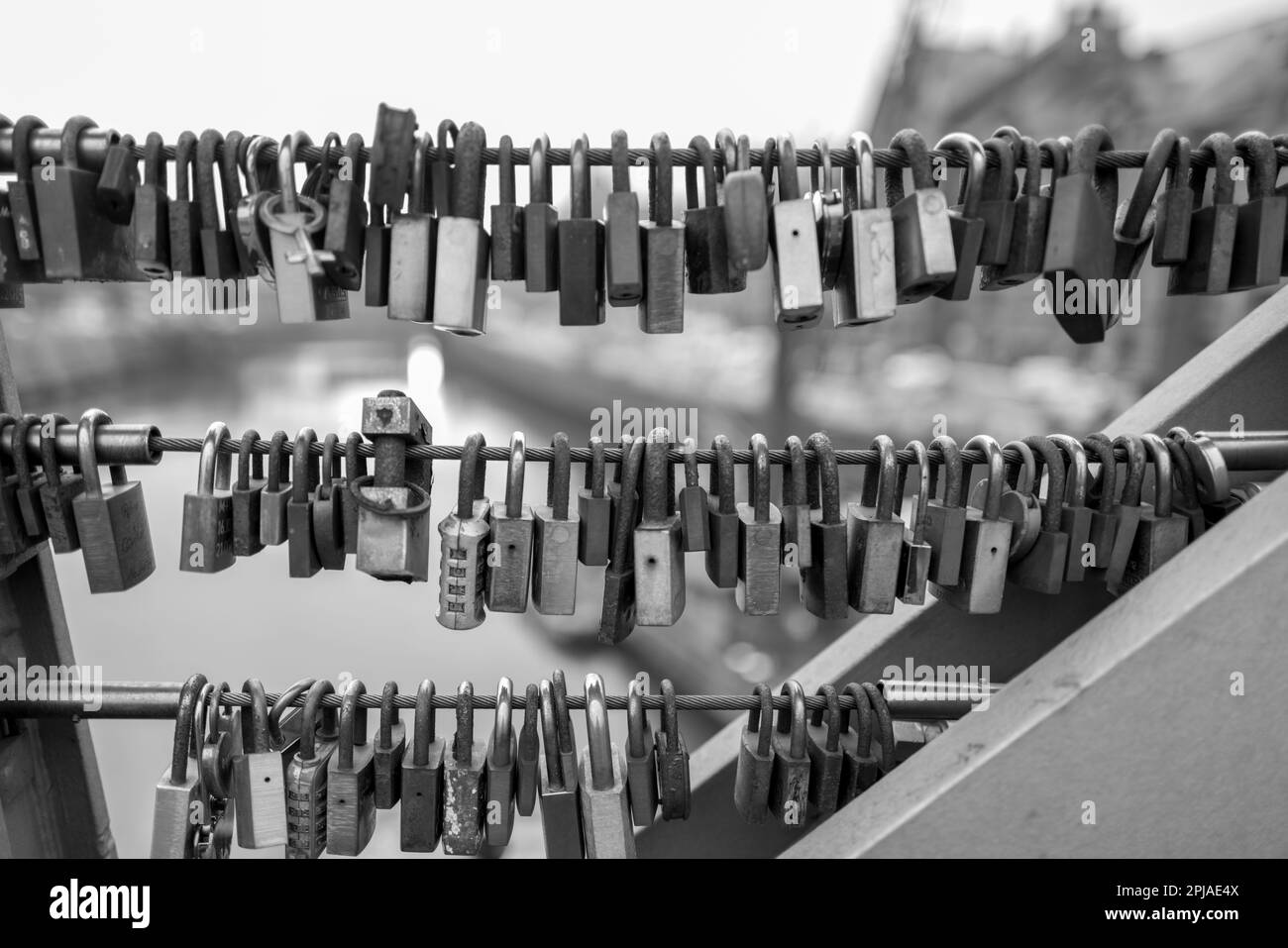 Love locks hanging on a railing Black and White Stock Photos & Images ...