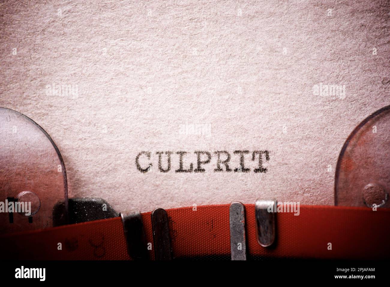 Culprit word written with a typewriter Stock Photo - Alamy