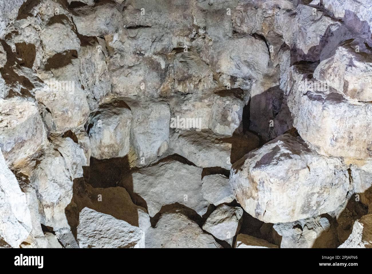 Rocks inside the empty main chamber of the Red Pyramid at the ...