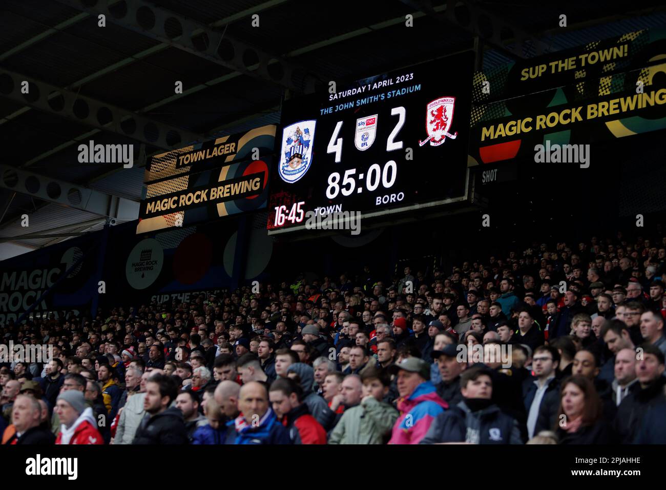 Fans in the stands with the scoreboard showing the 4-2 scoreline during ...
