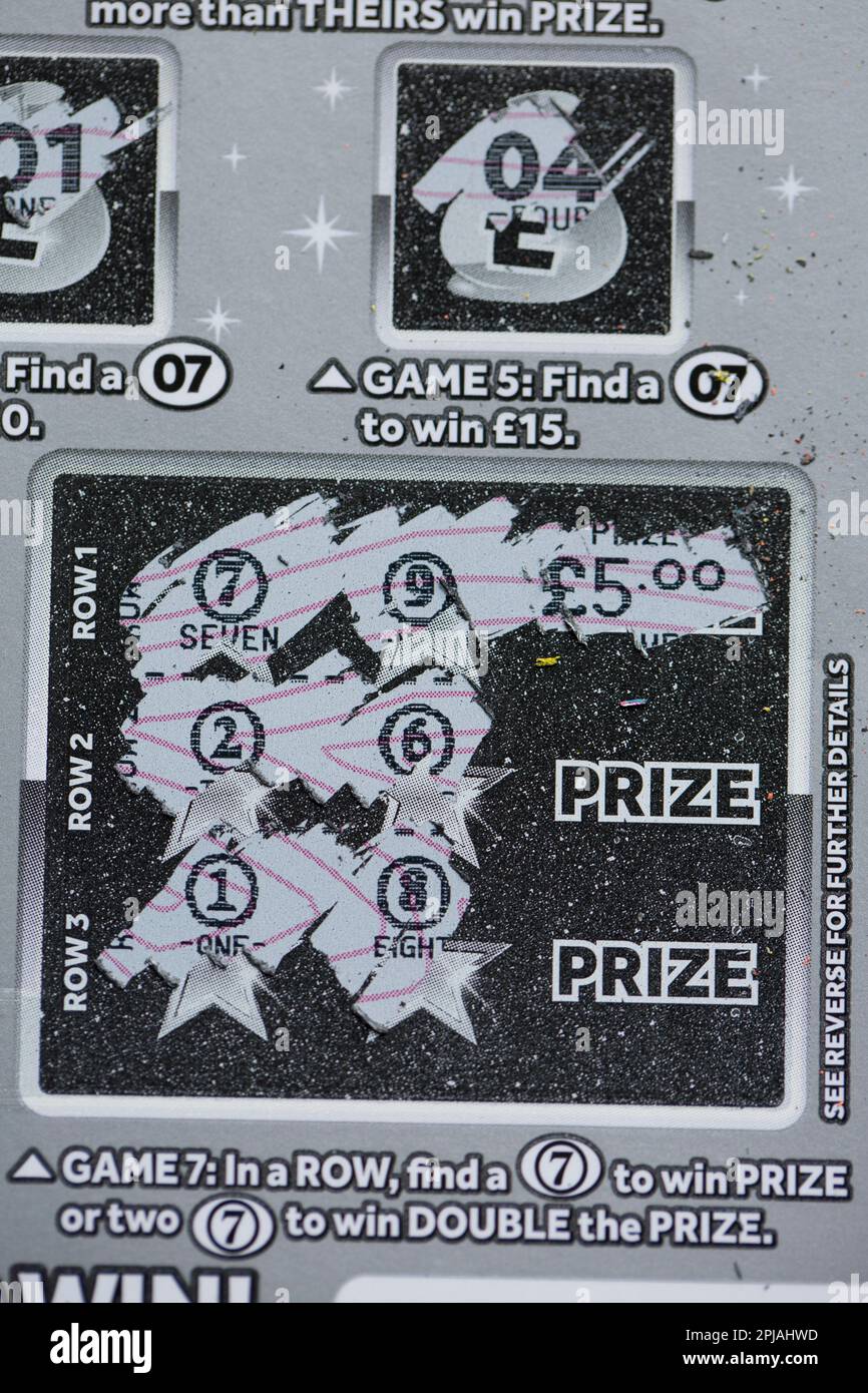 A winning scratchcard with a prize of five pounds. England UK GB Stock ...