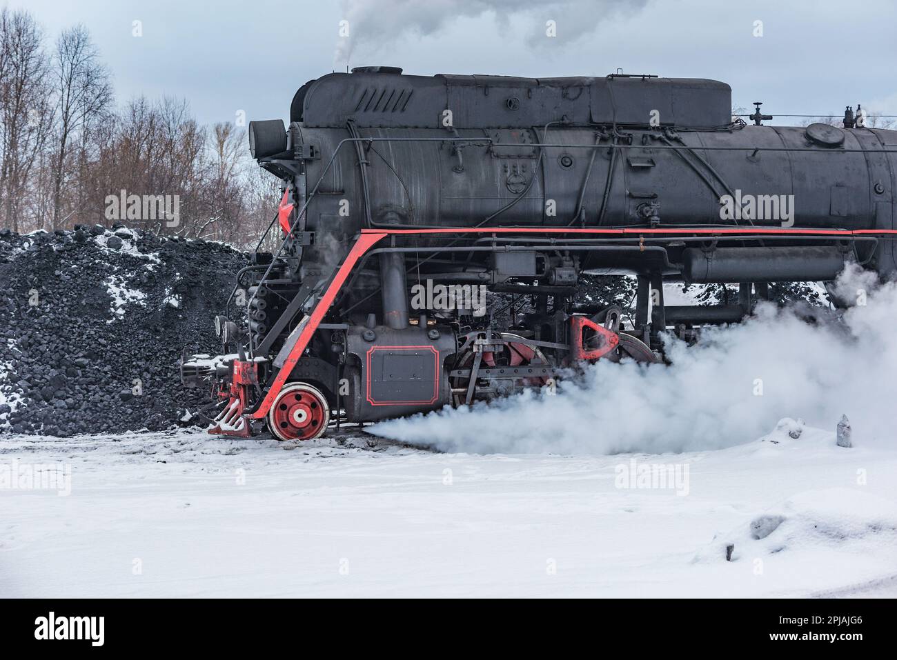 Retro steam locomotive before coal loading at winter morning time Stock ...