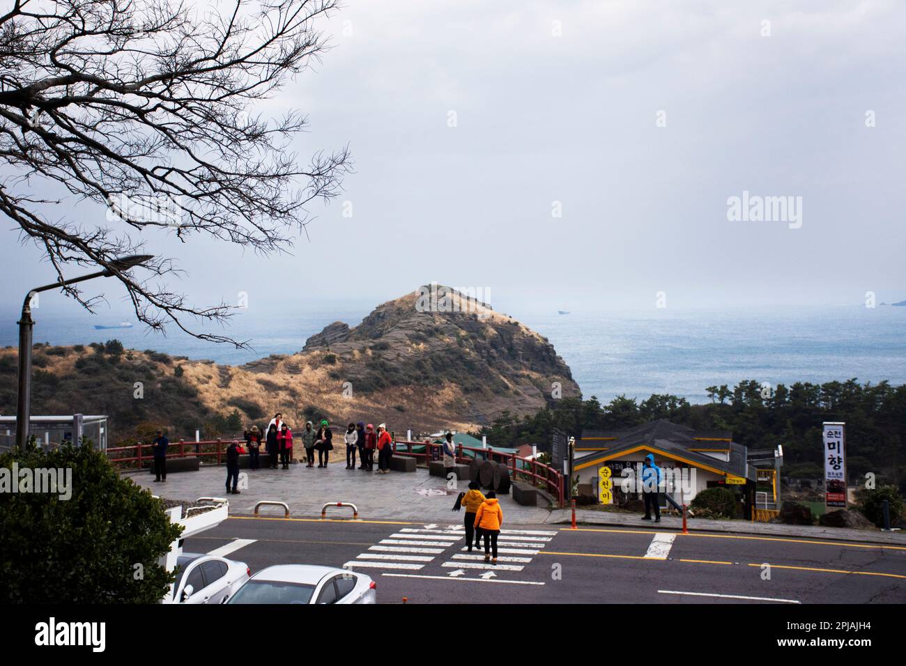 View landscape jeju island and seascape sea ocean with cityscape ...