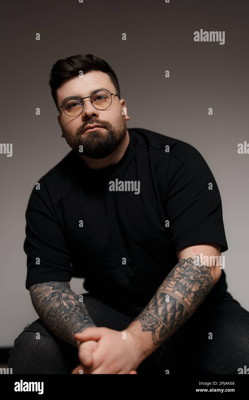 Overweight man sitting on chair hi-res stock photography and images - Alamy