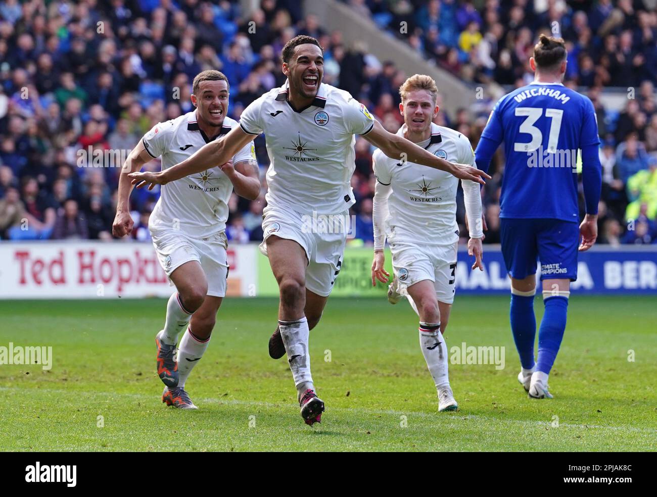 Swansea City's Ben Cabango celebrates scoring their side's third goal ...