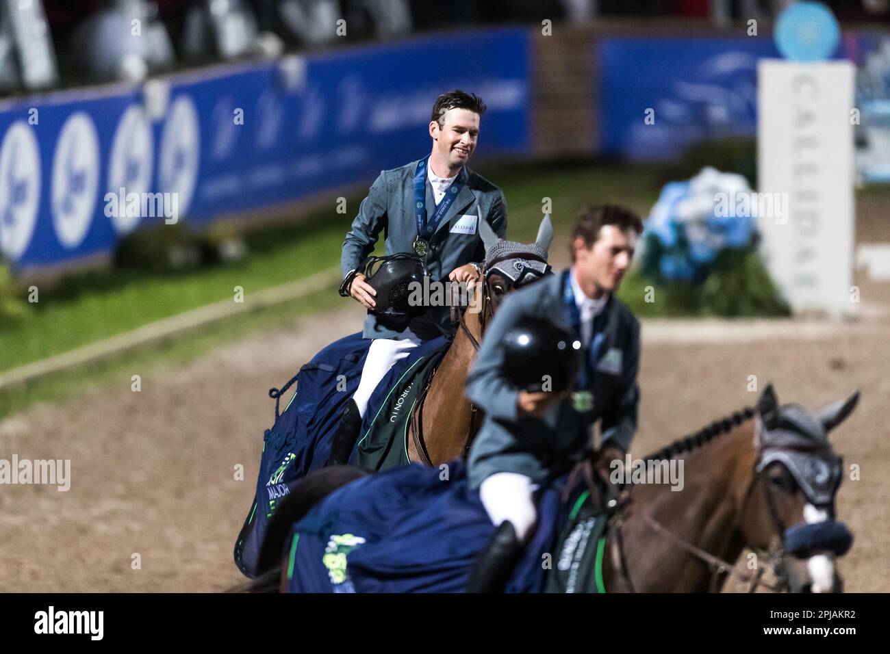Simon McCarthy and Mark Bluman of Team Helios take a victory lap after ...