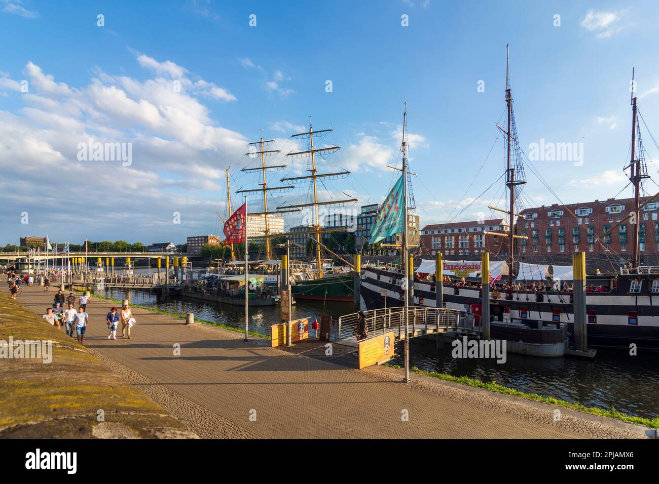 Bremen: river Weser, promenade Weserpromenade, green sail ship ...