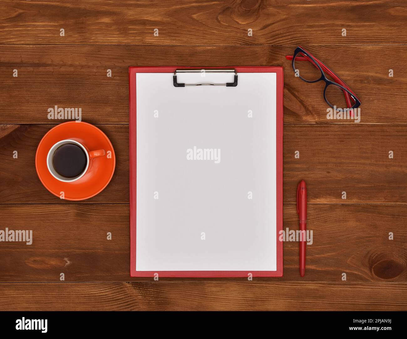 blank clipboard on wooden table, top view Stock Photo - Alamy