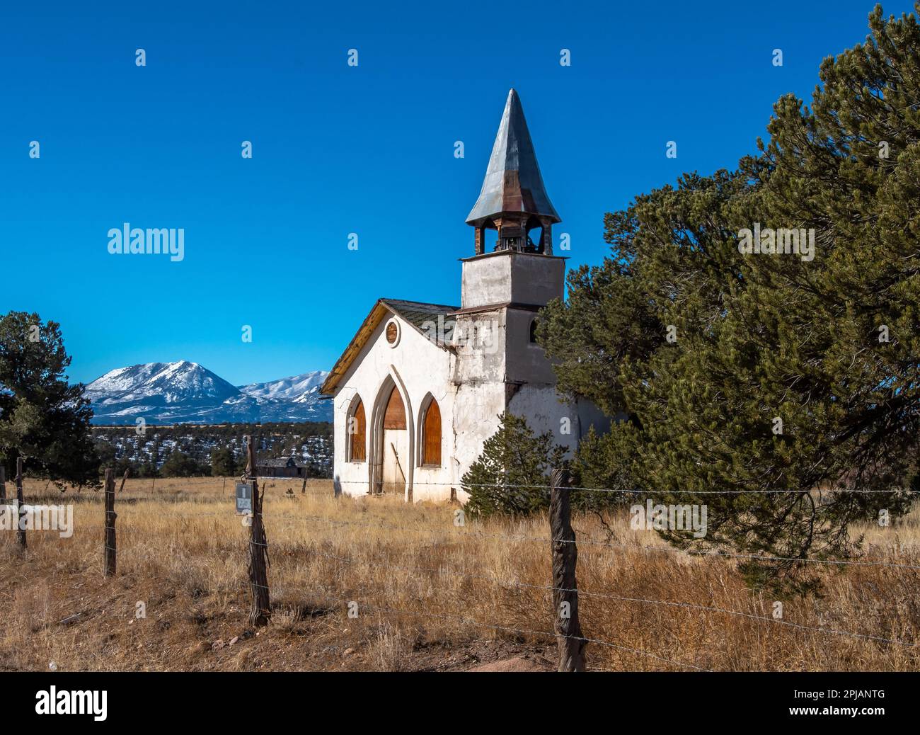 An old abandoned and neglected church still stands tall in the rural ...