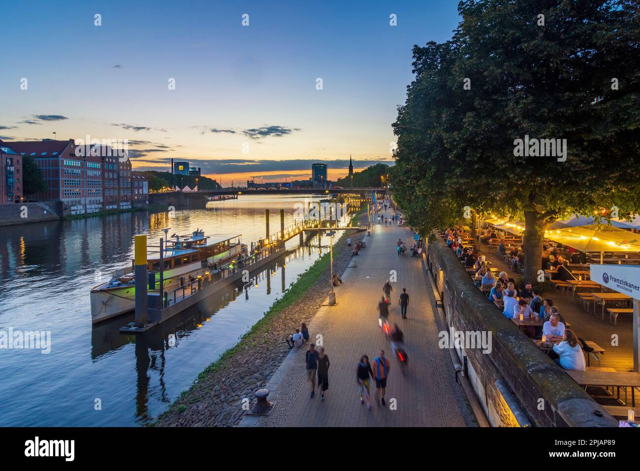 Bremen: river Weser, promenade Weserpromenade, open air restaurant ...