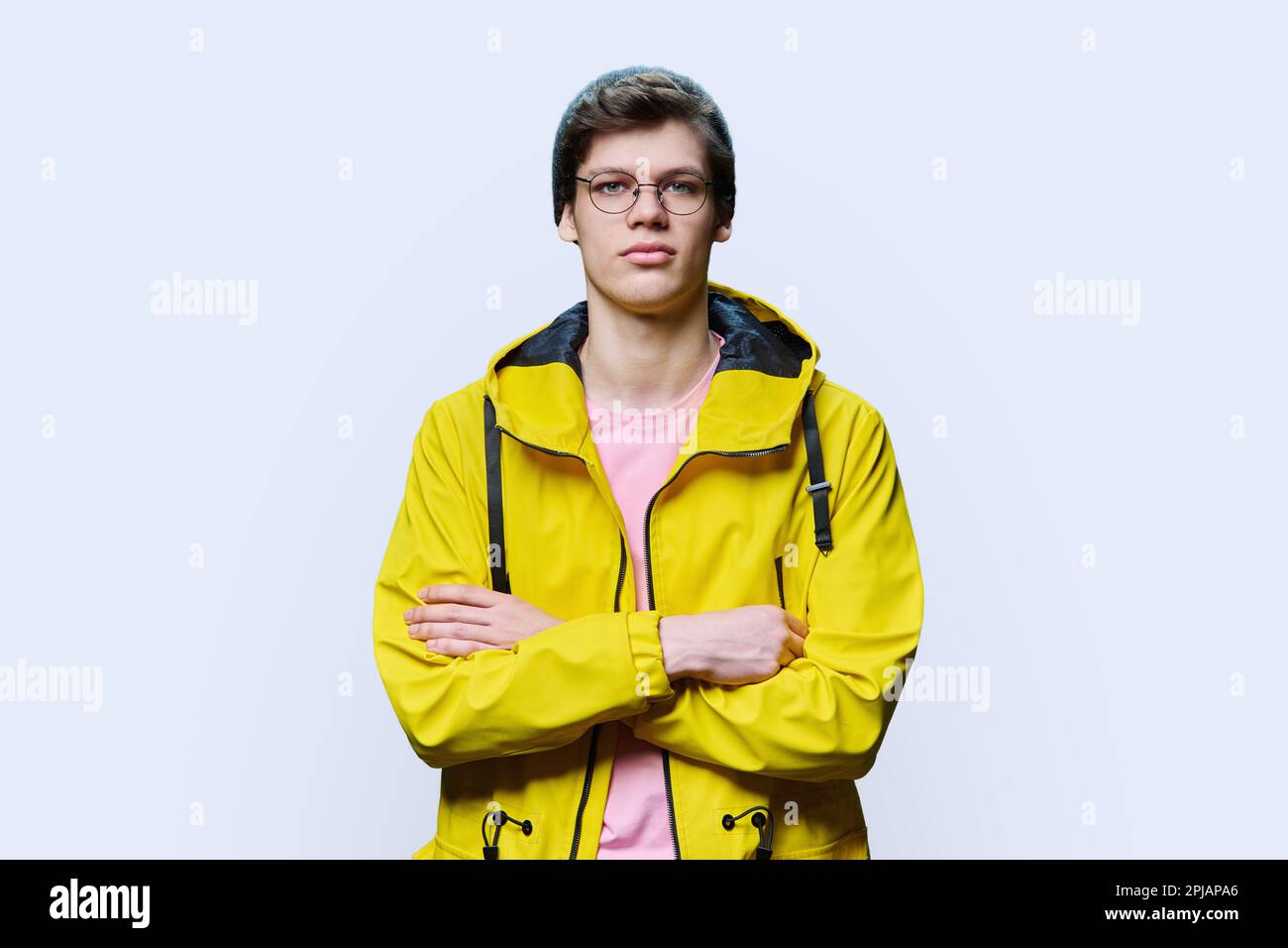 Handsome guy posing arms hi-res stock photography and images - Alamy