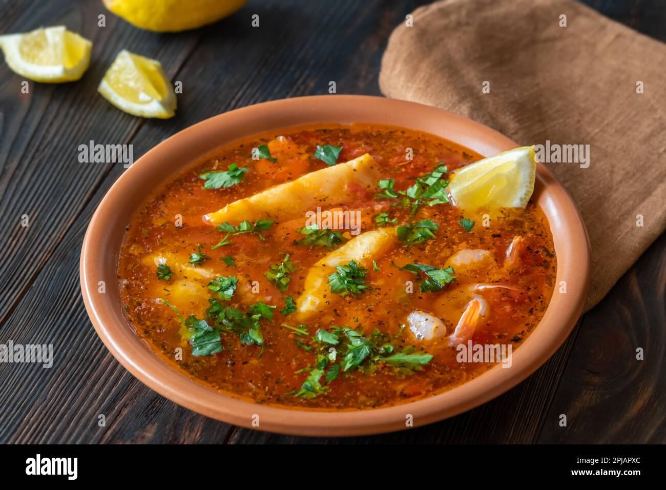 Psarosoupa traditional greek fish and vegetable soup Stock Photo - Alamy