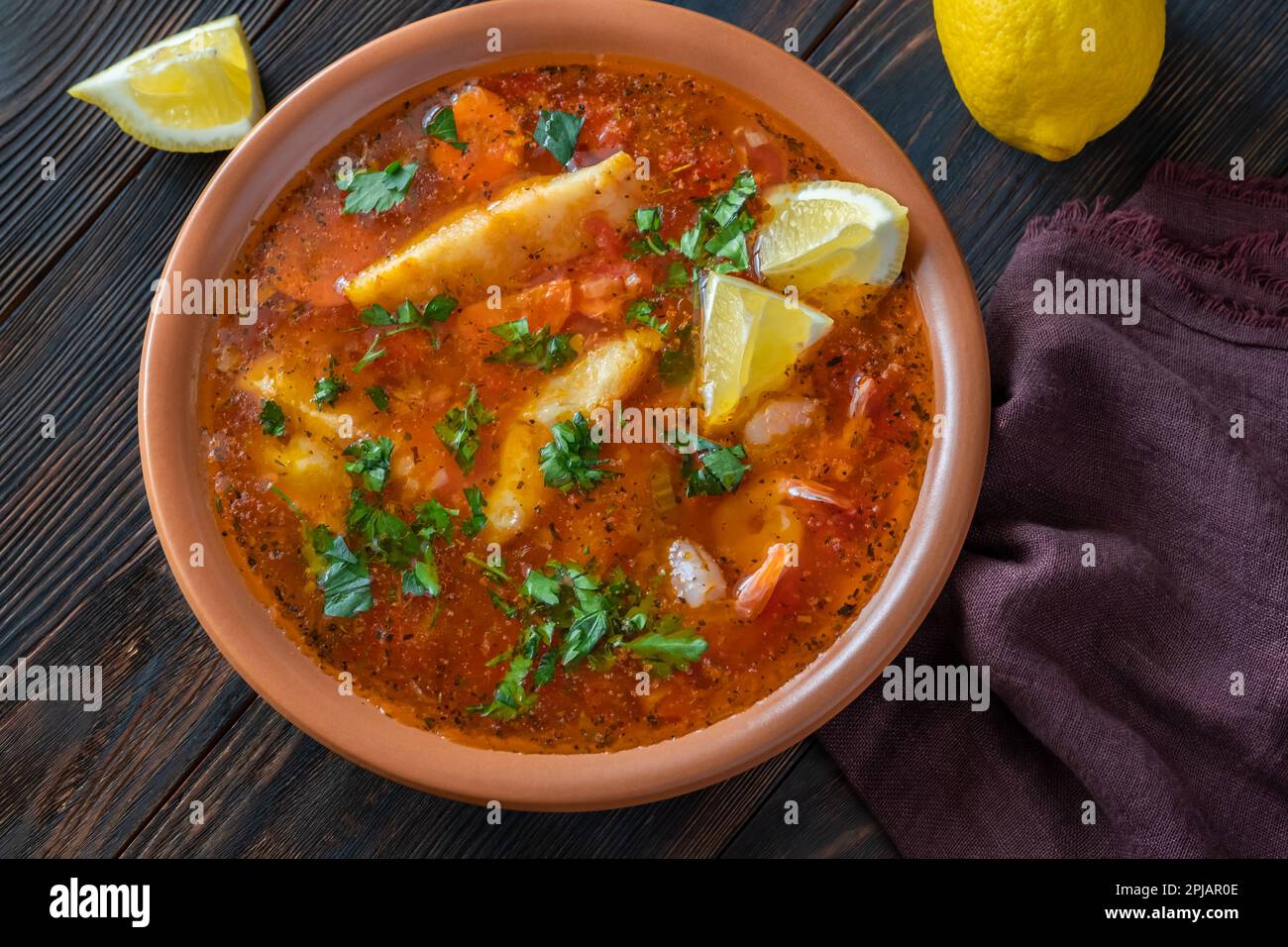 Psarosoupa traditional greek fish and vegetable soup Stock Photo - Alamy