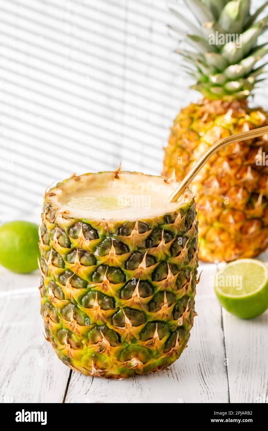 Greek Pina Colada cocktail served in pineapple shell Stock Photo - Alamy