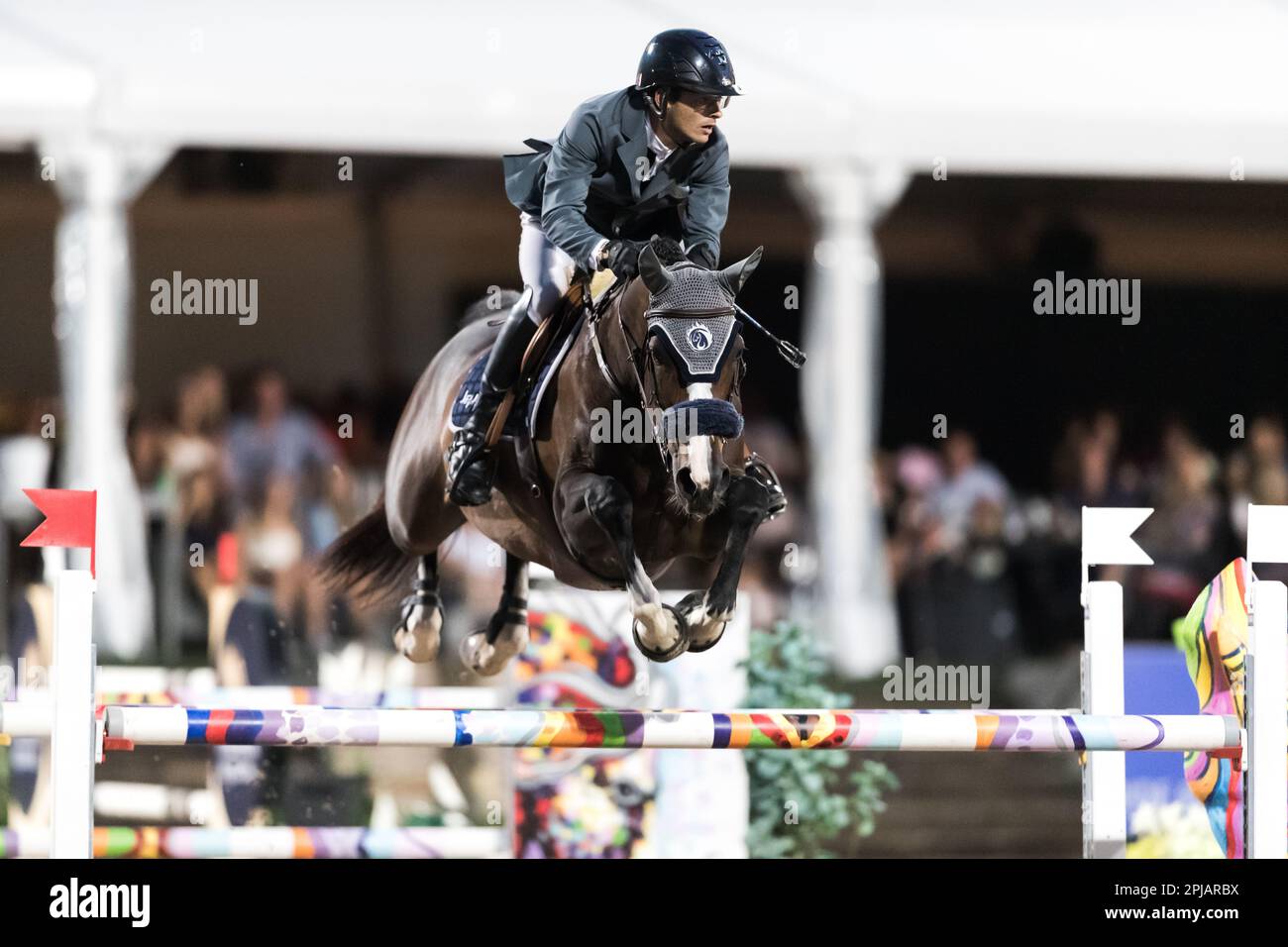 Riders compete at a Major League Show Jumping event at Angelstone ...