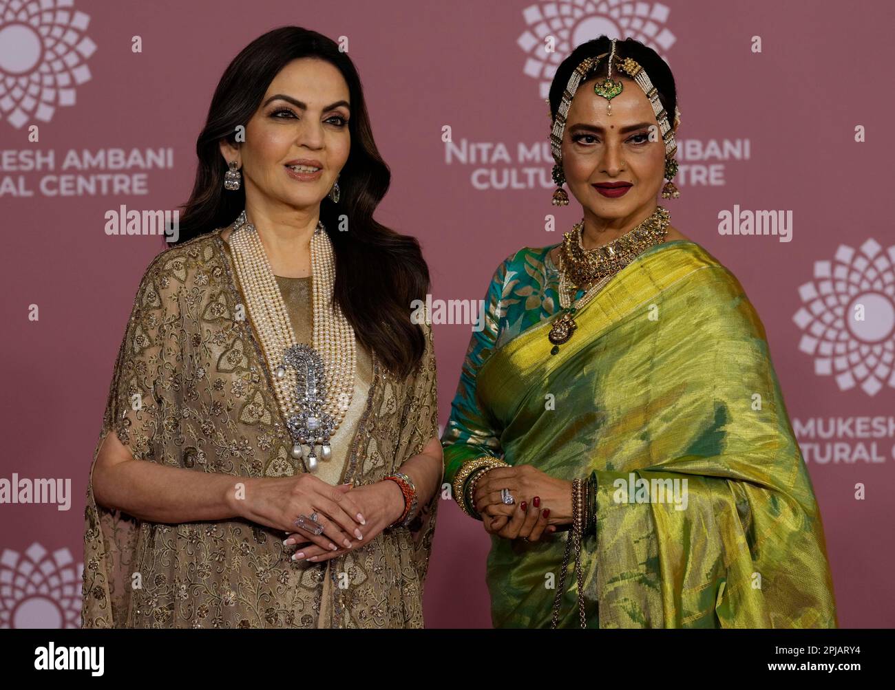 Neeta Ambani and actress Rekha, right, attend the second day inaugural ...