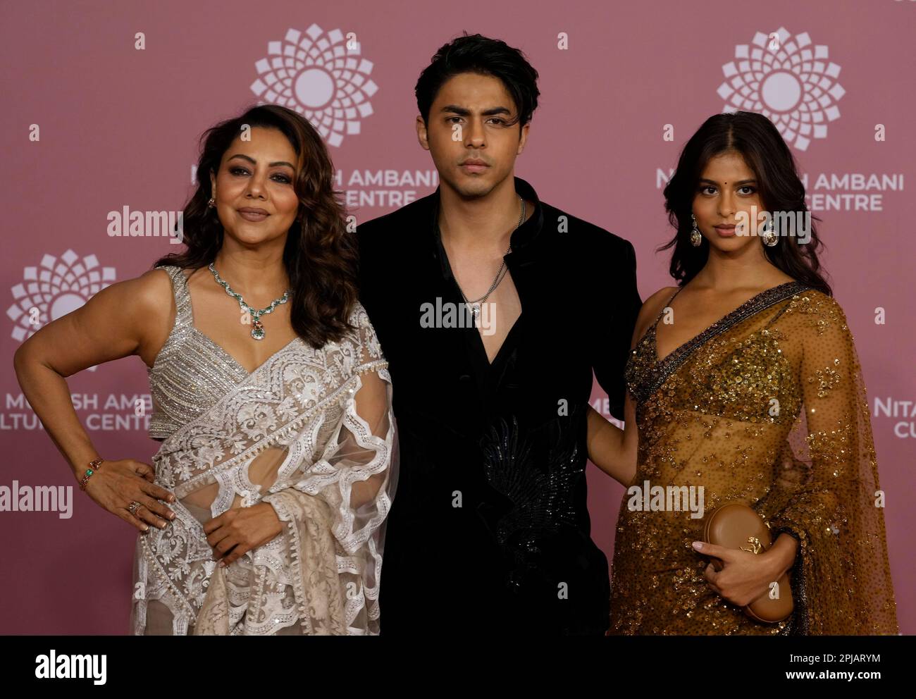 Shah Rukh Khan's wife Gauri Khan, left, son Aryan Khan, centre, and ...