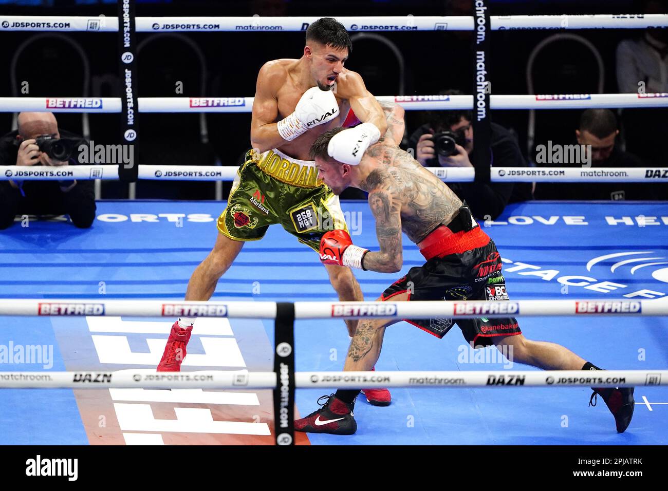 Jordan Flynn (left) and Kane Baker in action during the Super ...