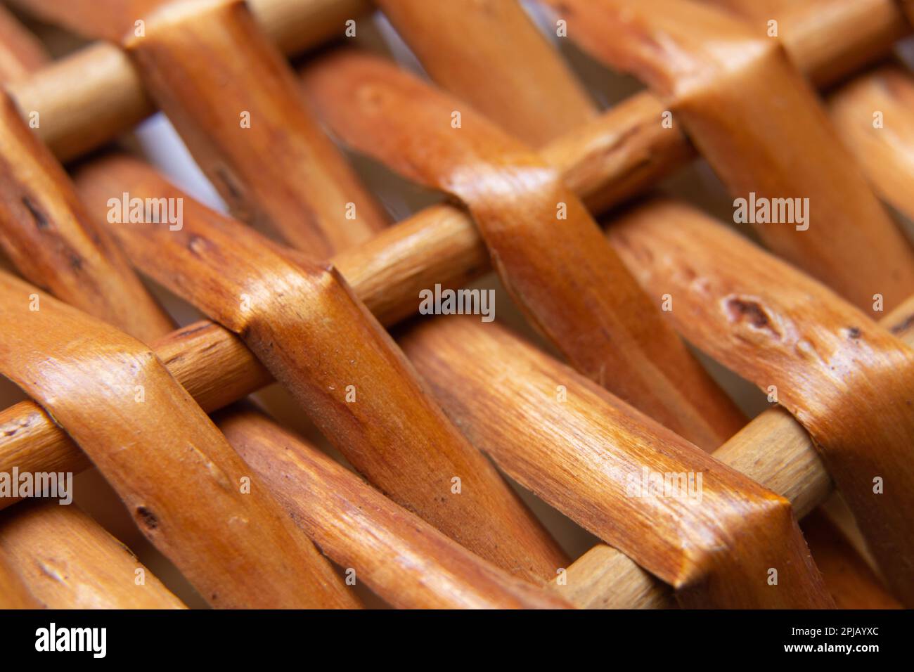 wicker basket of branches macro on an isolated background Stock Photo ...