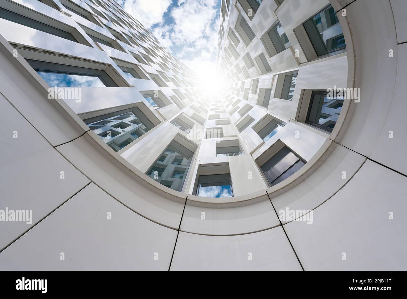 View upwards, along the facade of a skyscraper in Berlin with strong ...