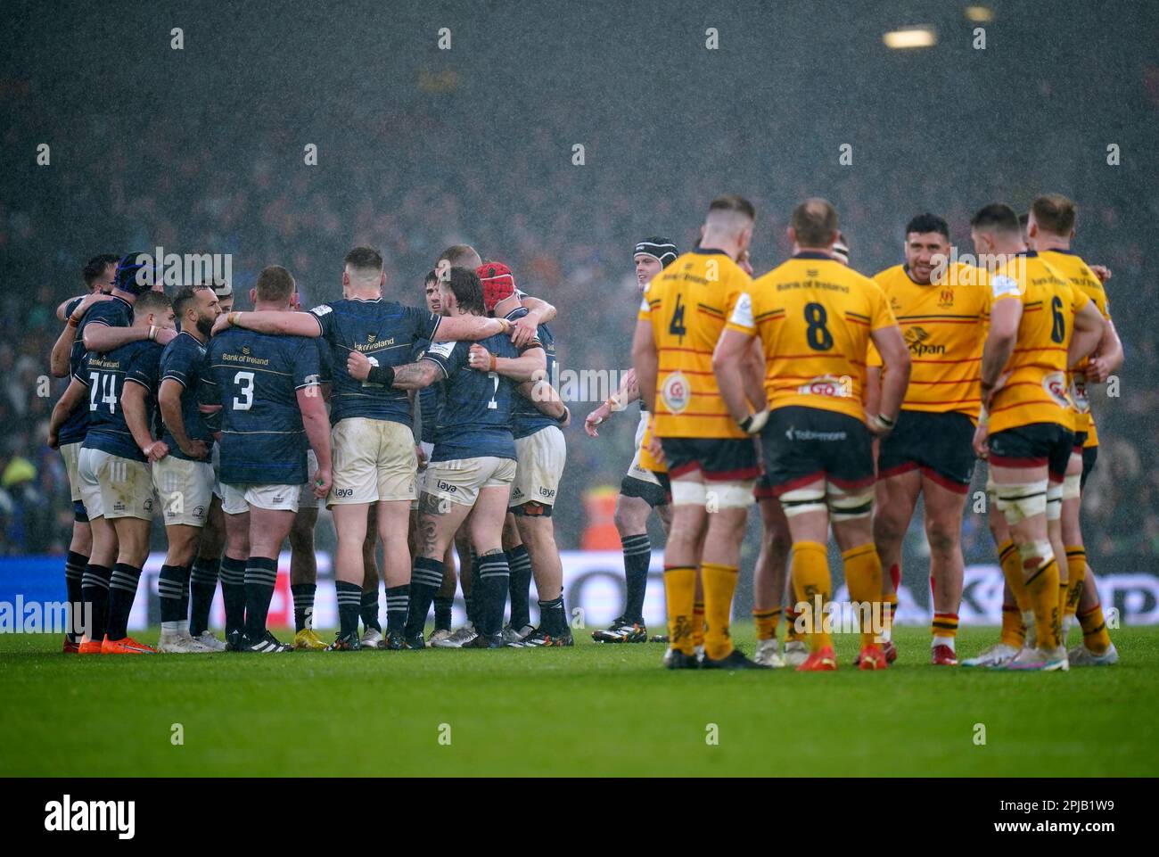 Teams huddle together on the pitch during the Heineken Champions Cup ...