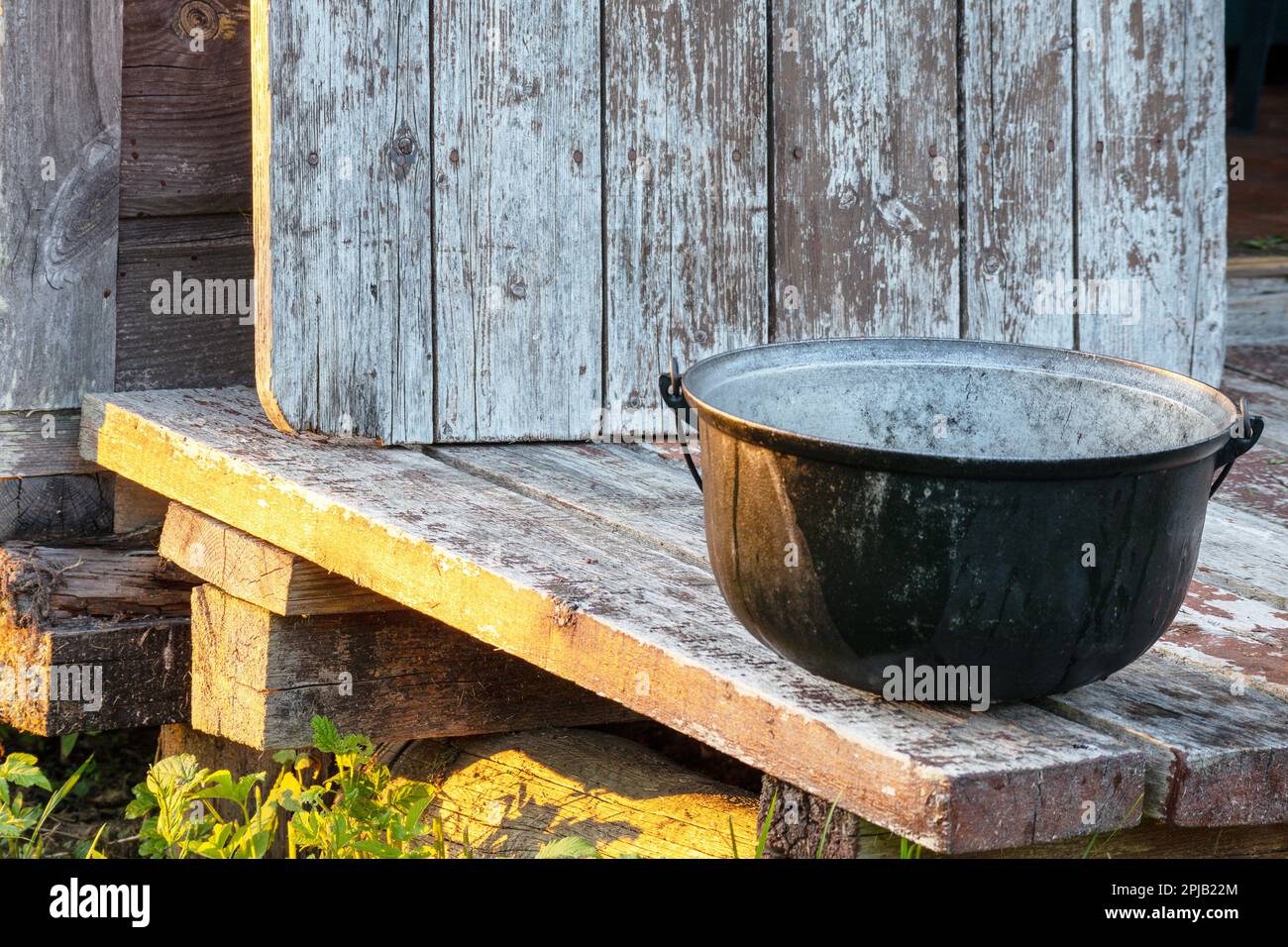 Old red metal bucket hi-res stock photography and images - Alamy