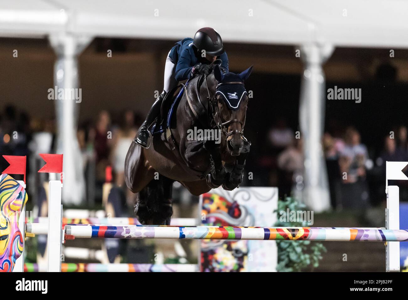 Riders compete at a Major League Show Jumping event at Angelstone ...
