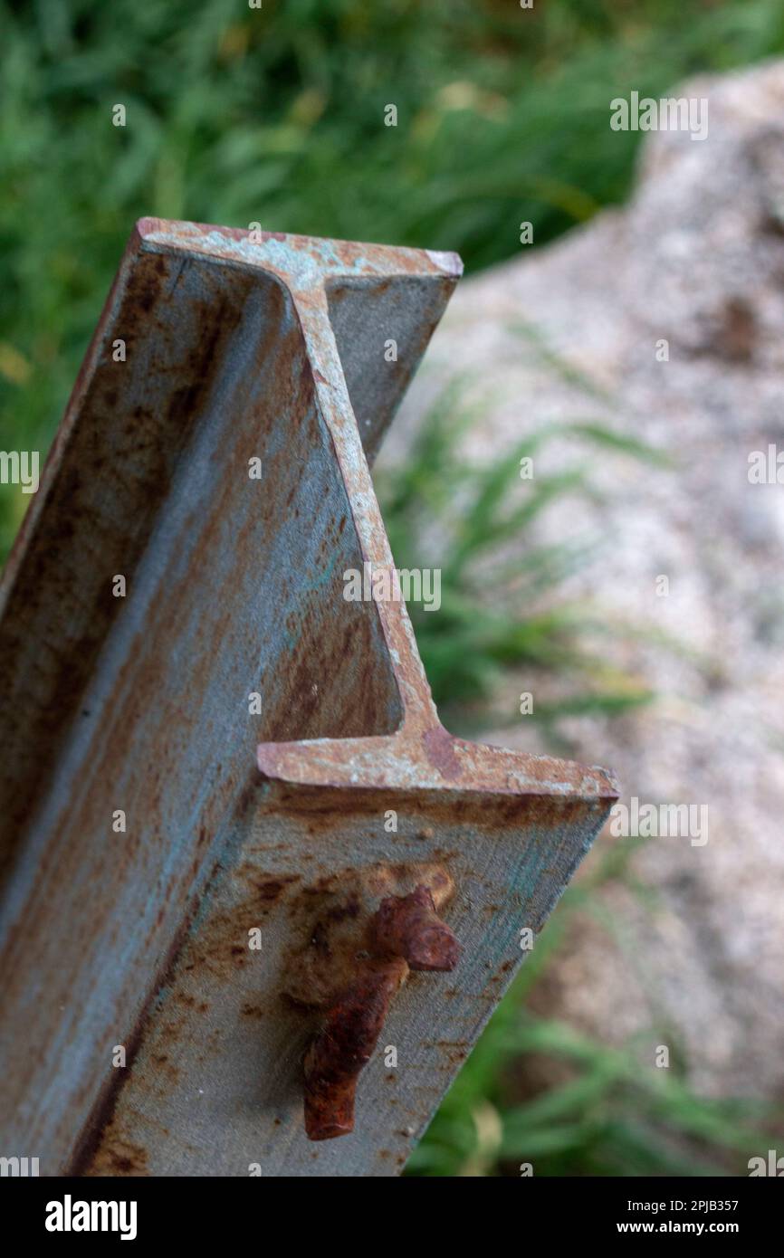 rusty iron beam due to inclement weather, its profiles can also be seen ...