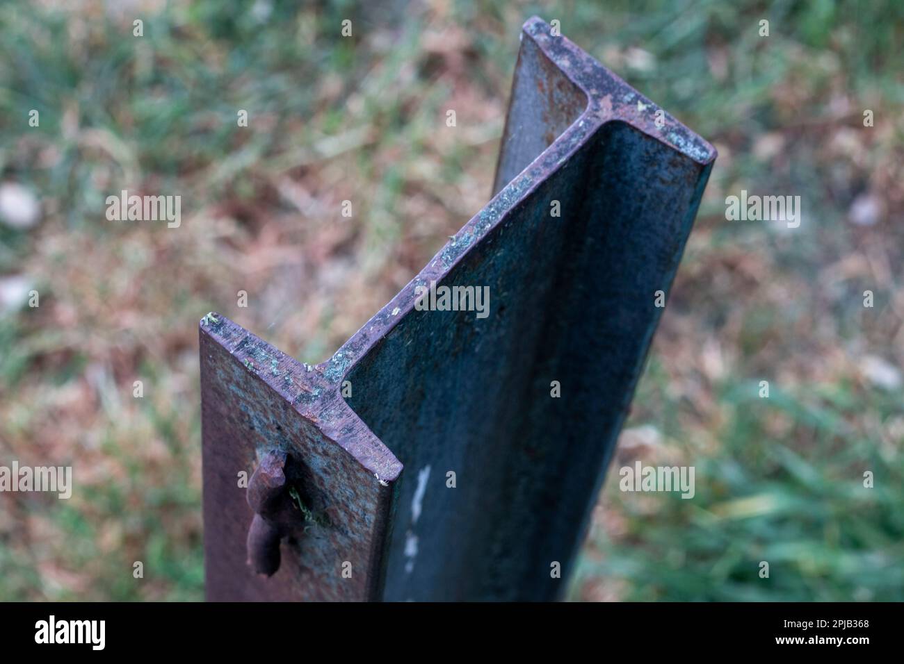 rusty iron beam due to inclement weather, its profiles can also be seen ...