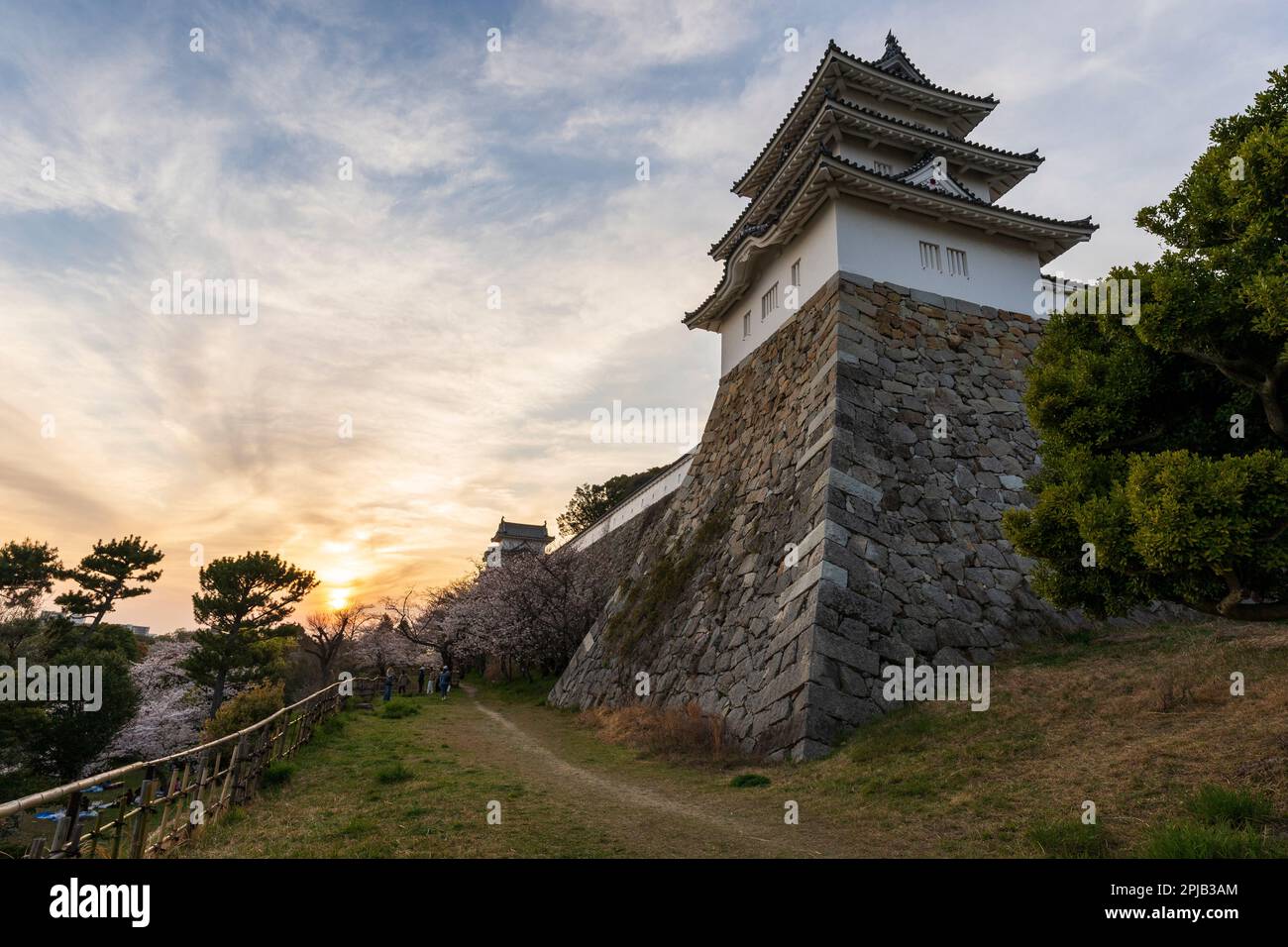 Sunset at Akashi castle in Japan. View along the two Edo Period yagura ...