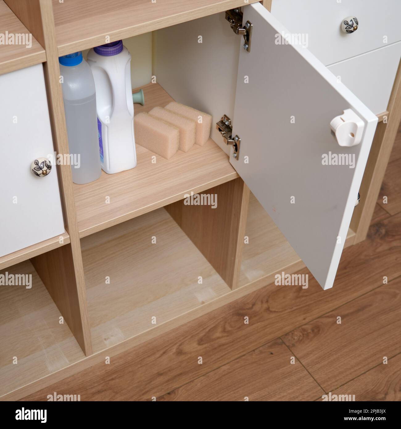 Storage of household cleaning products and household chemicals. Cabinet ...