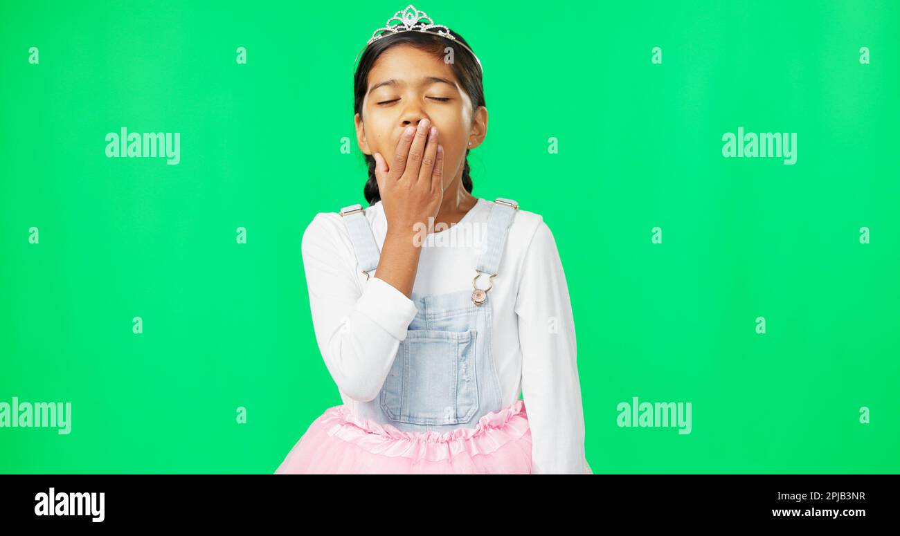 Tired, yawning and bored with child in green screen studio for fatigue ...