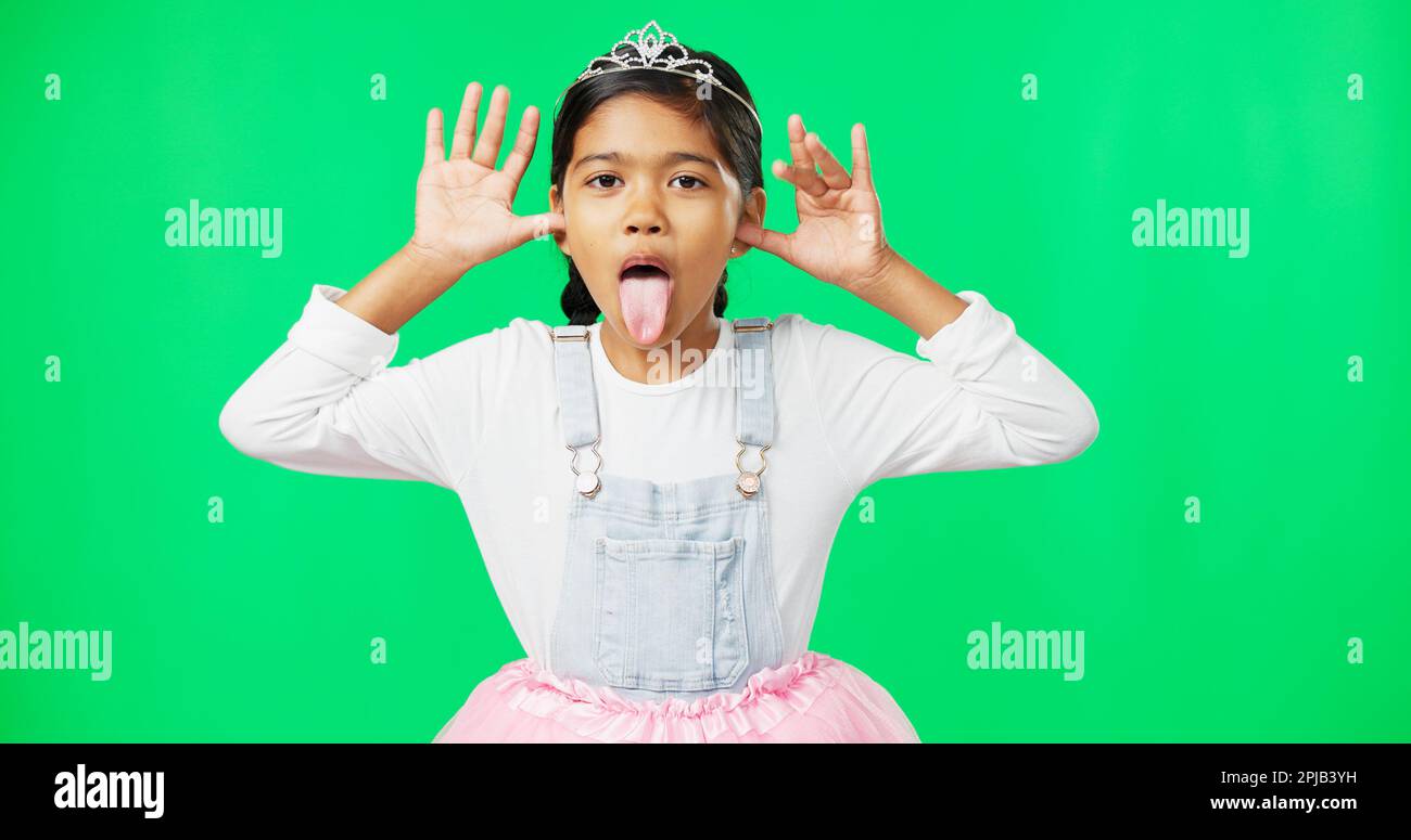 Princess, funny face and girl on green screen in studio isolated on ...